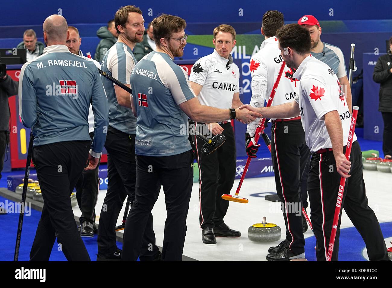 Team Canada and Norway react after the men's curling round robin ...