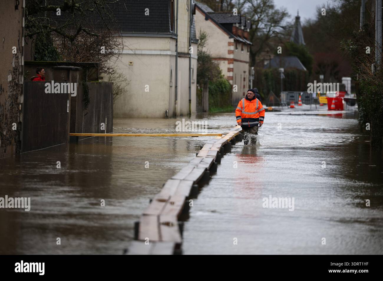 Inhabitant pictured during flooding of the Maine River at the mouth of ...