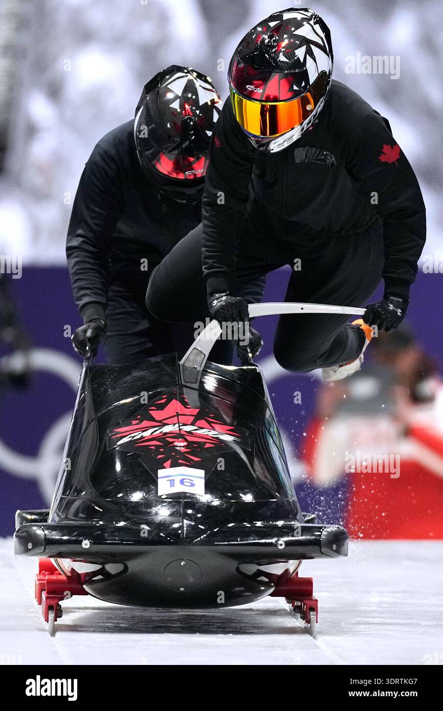 Canada's Bianca Ribi, right, starts for a two women bobsled training ...