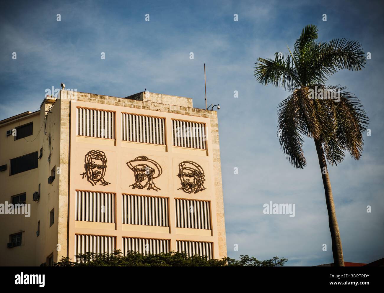 Metal portraits depicting (from left to right) Camilo Cienfuegos ...