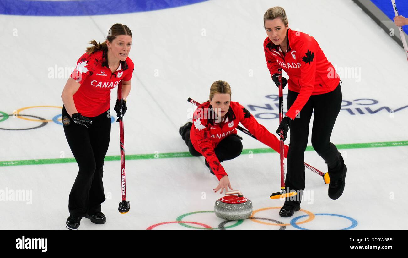Canada's Sarah Wilkes, Emma Miskew and Tracy Fleury compete during a ...