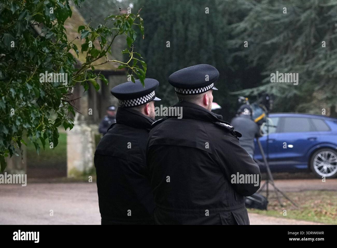 Police officers guard the entrance to the Sandringham Royal Estate in ...