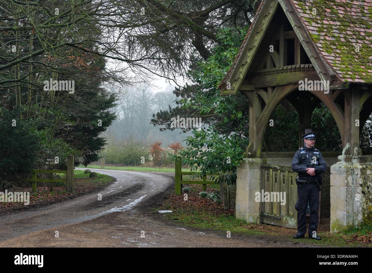 A Police officer guards the entrance to Wood Farm at the Sandringham ...