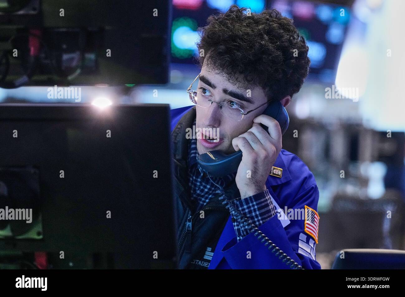 Specialist Alex Weitzman works at his post on the floor of the New York ...
