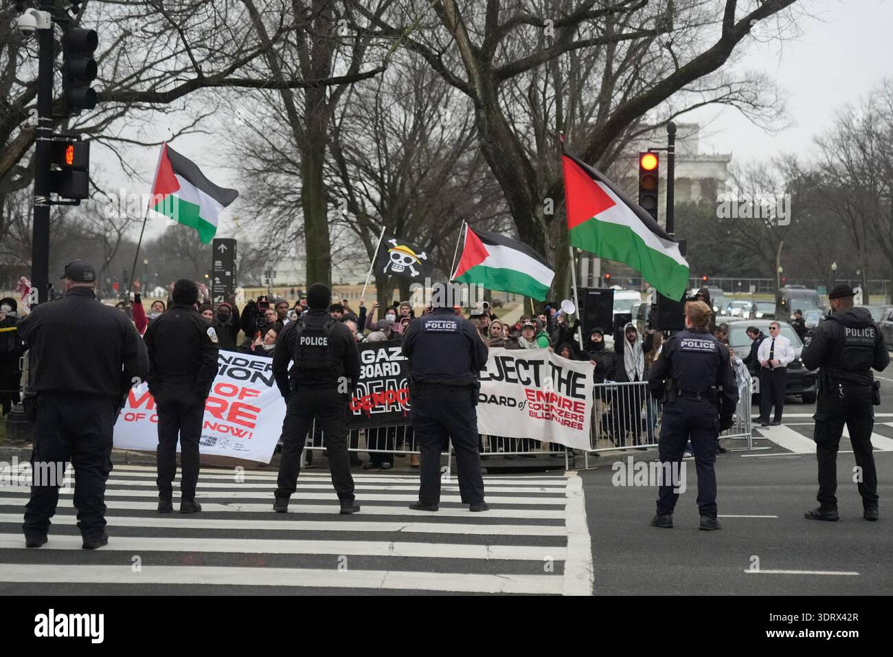 People hold Palestinian flags as they protest outside of the U.S ...