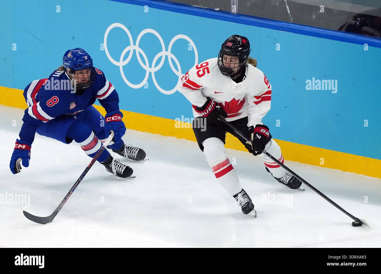 United States' Haley Winn (8) and Canada's Daryl Watts battle for the ...