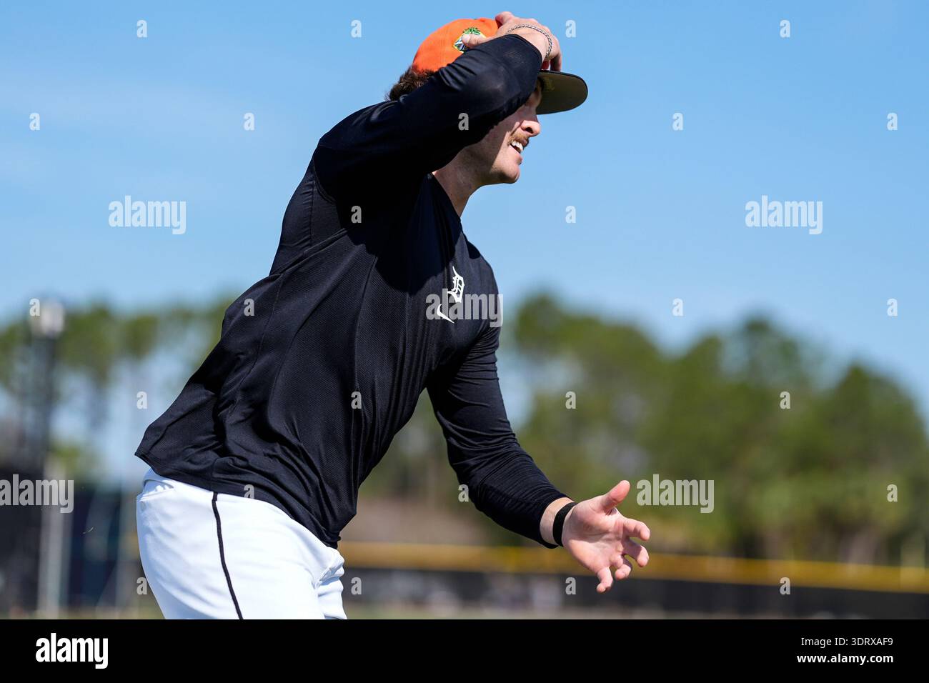 Detroit Tigers' John Peck runs during workouts at spring training ...