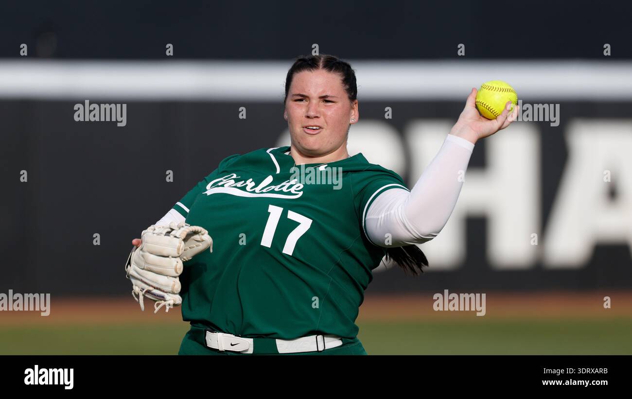 Charlotte's Sydney Lewis throws before an NCAA softball game against ...