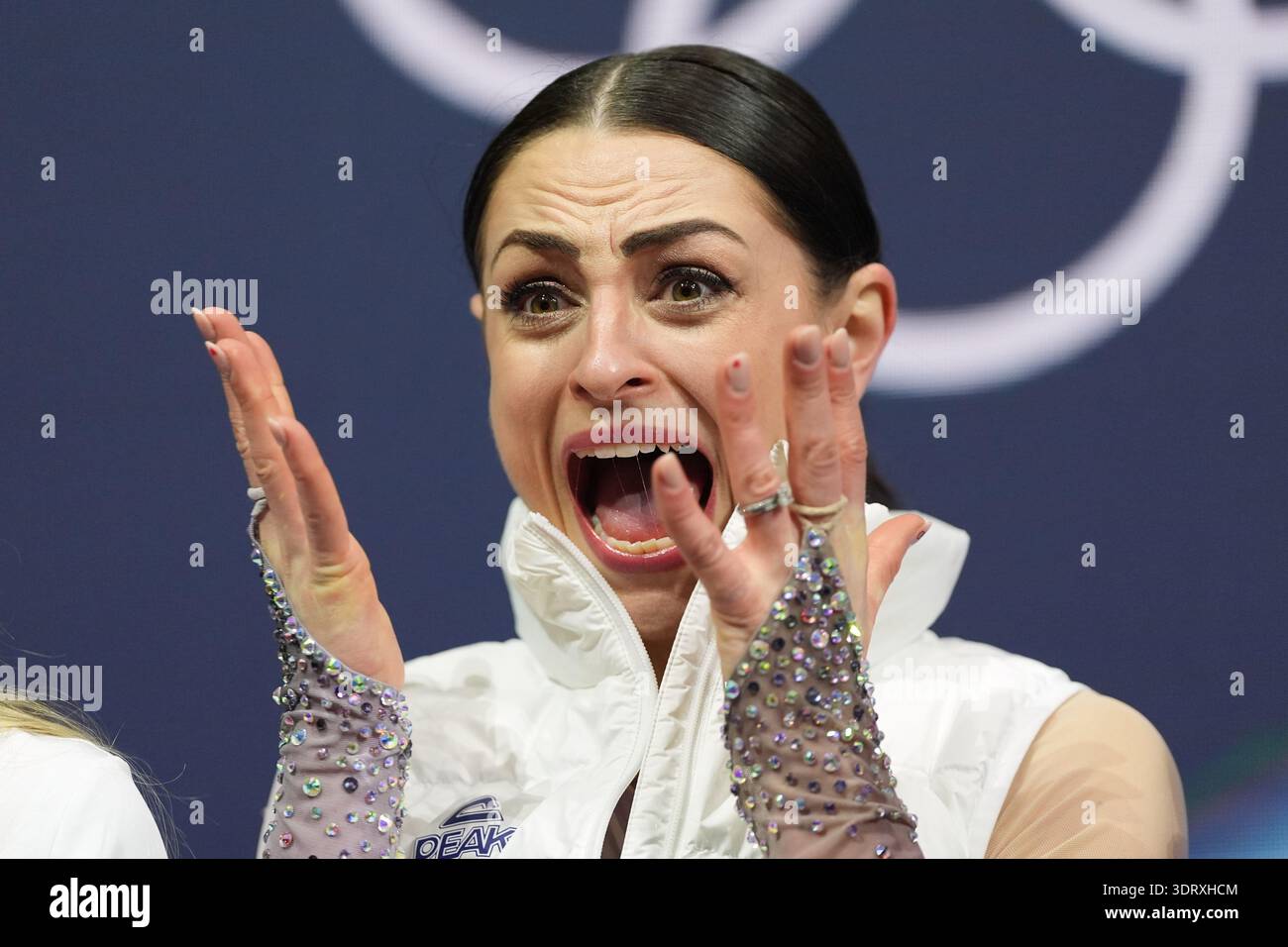 Julia Sauter of Romania reacts to her score after competing in the ...