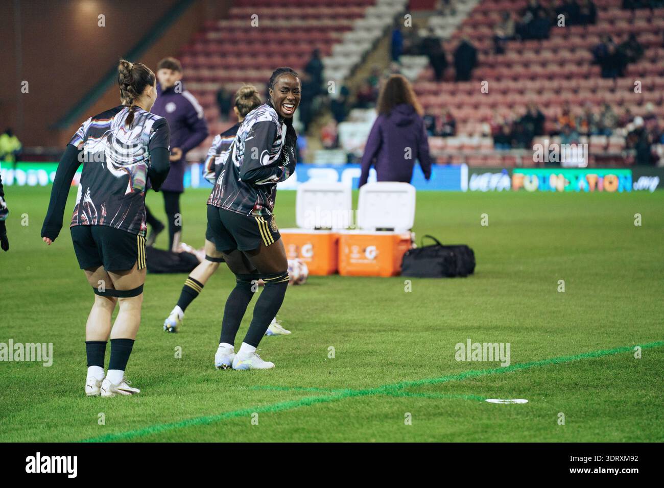 Manchester, UK, 19th Feb 2026: Simi Awujo (centre) warming up before ...