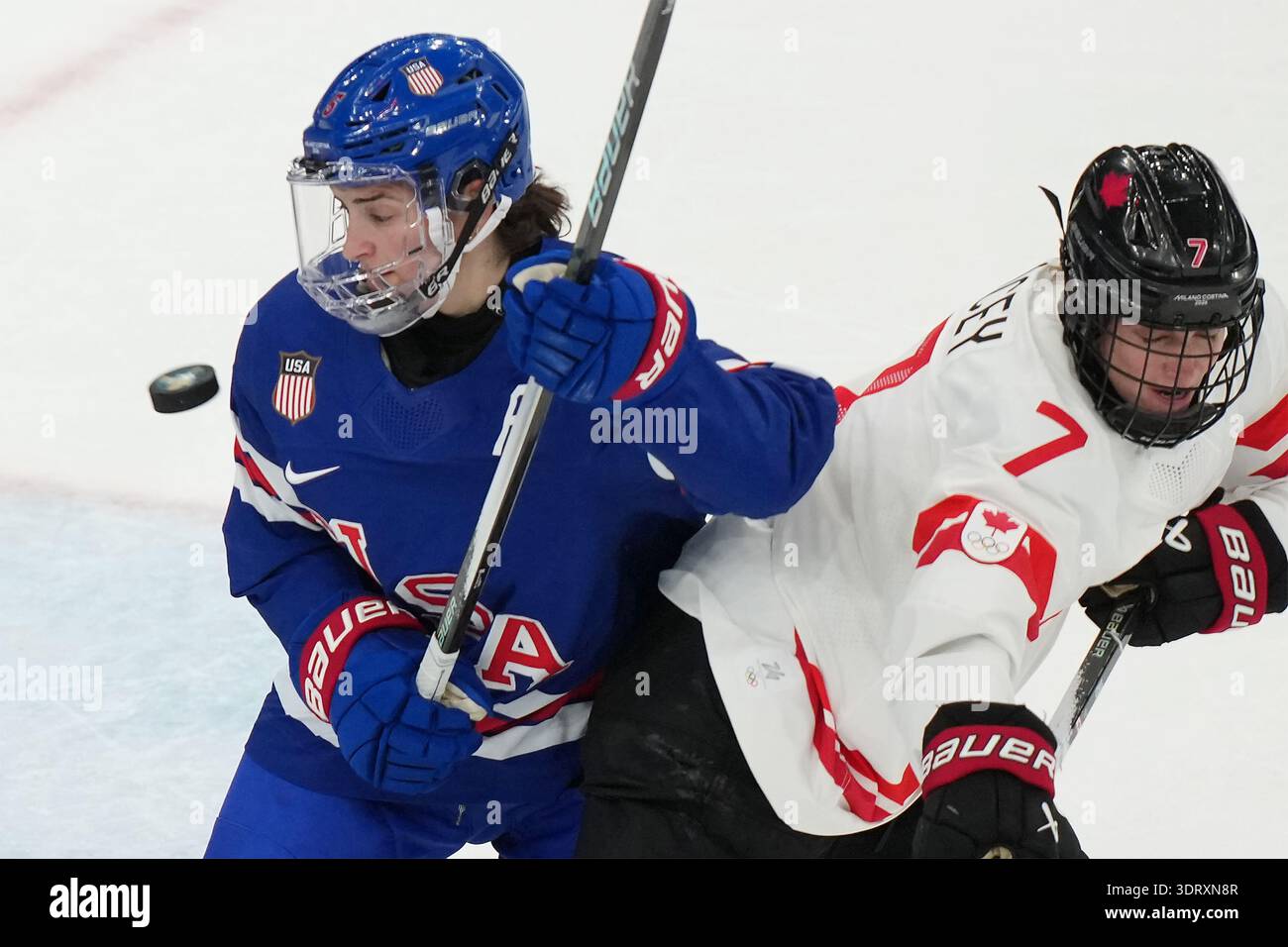 United States' Megan Keller (5) and Canada's Laura Stacey (7) battle ...