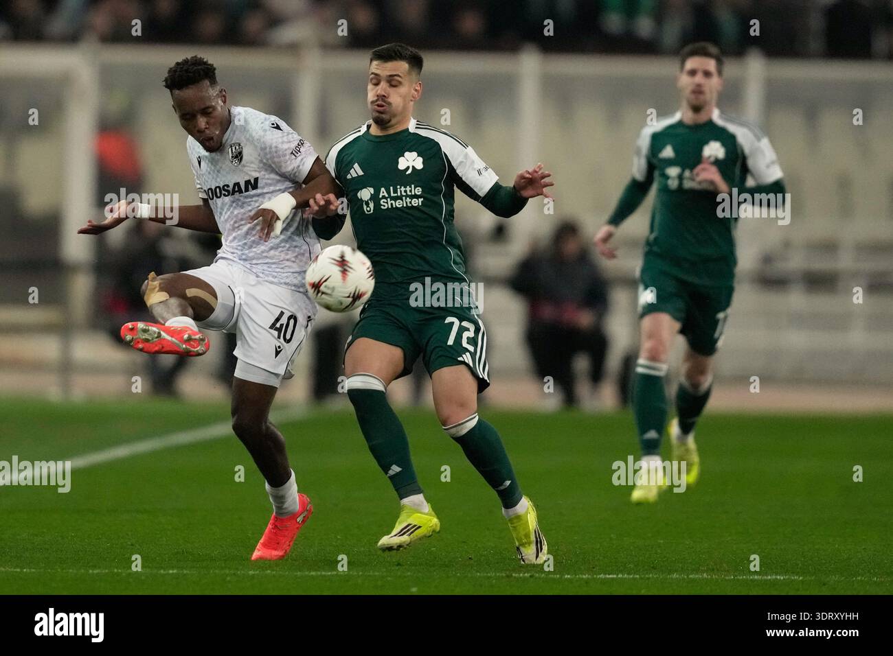 Plzen's Sampson Dweh passes the ball by Panathinaikos' Milos Pantovic ...