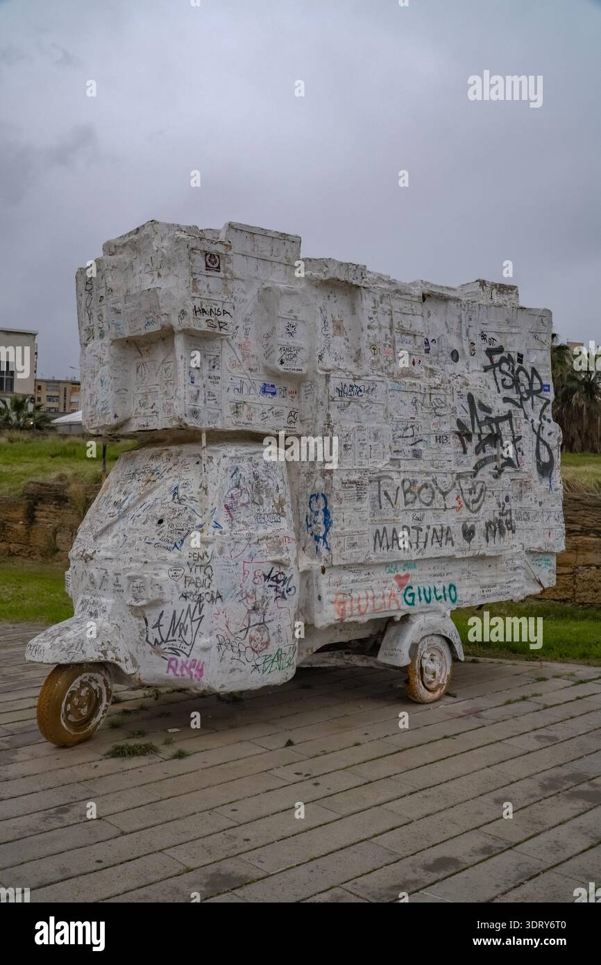Ape Bianca, sculpture based on Piaggio Ape. Covered in tags and ...
