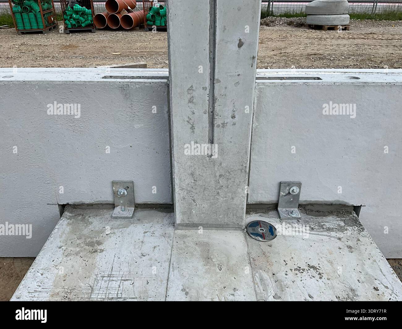 Close-up detail of a precast concrete wall system with a vertical ...