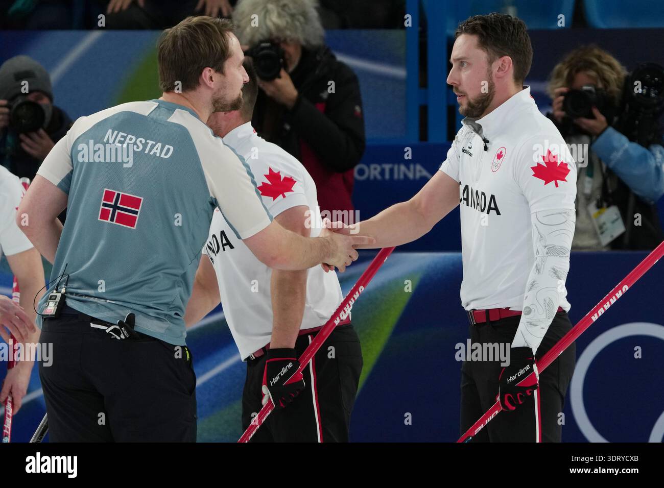Norway's Gaute Nepstad, left, shakes hands with Canada's Brett Gallant ...