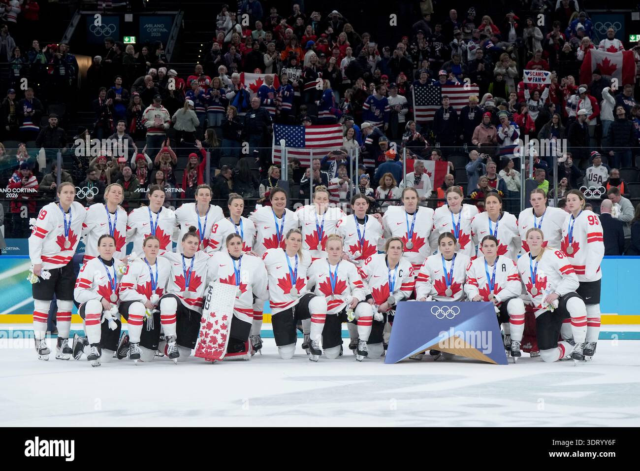 Team Canada players pose with their silver medals after losing to the ...