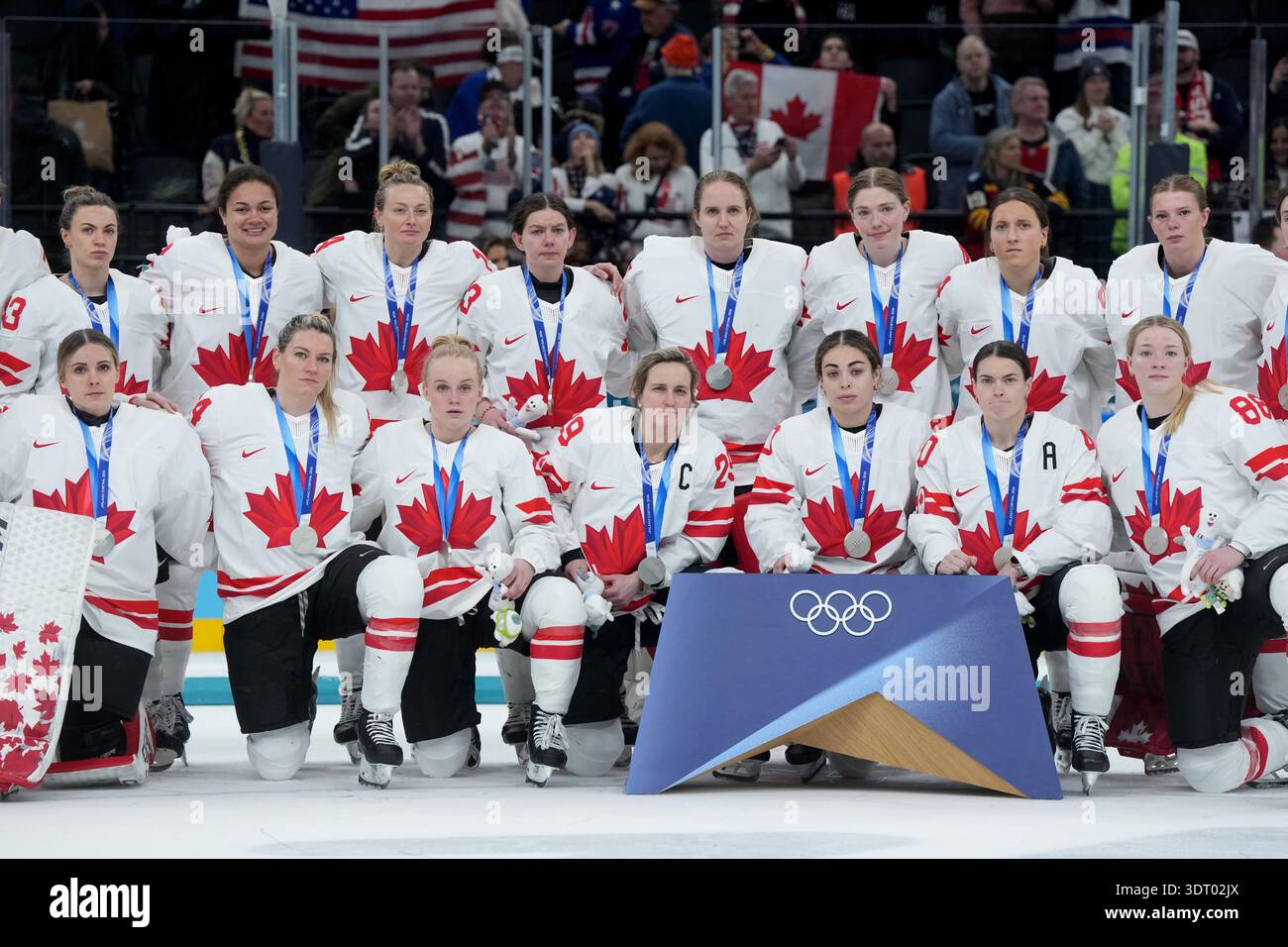 Team Canada players pose with their silver medals after losing to the ...