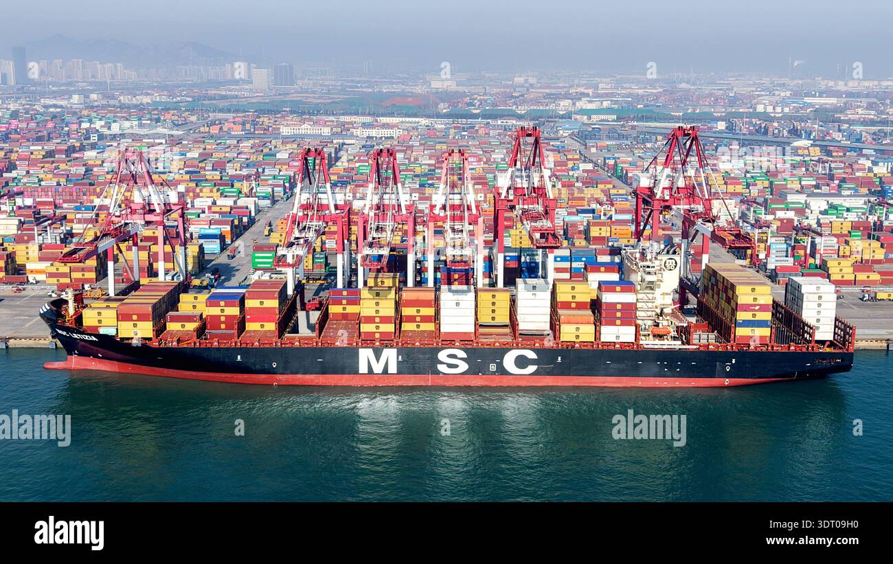 QINGDAO, CHINA - FEBRUARY 20, 2026 - A cargo ship is loading and ...