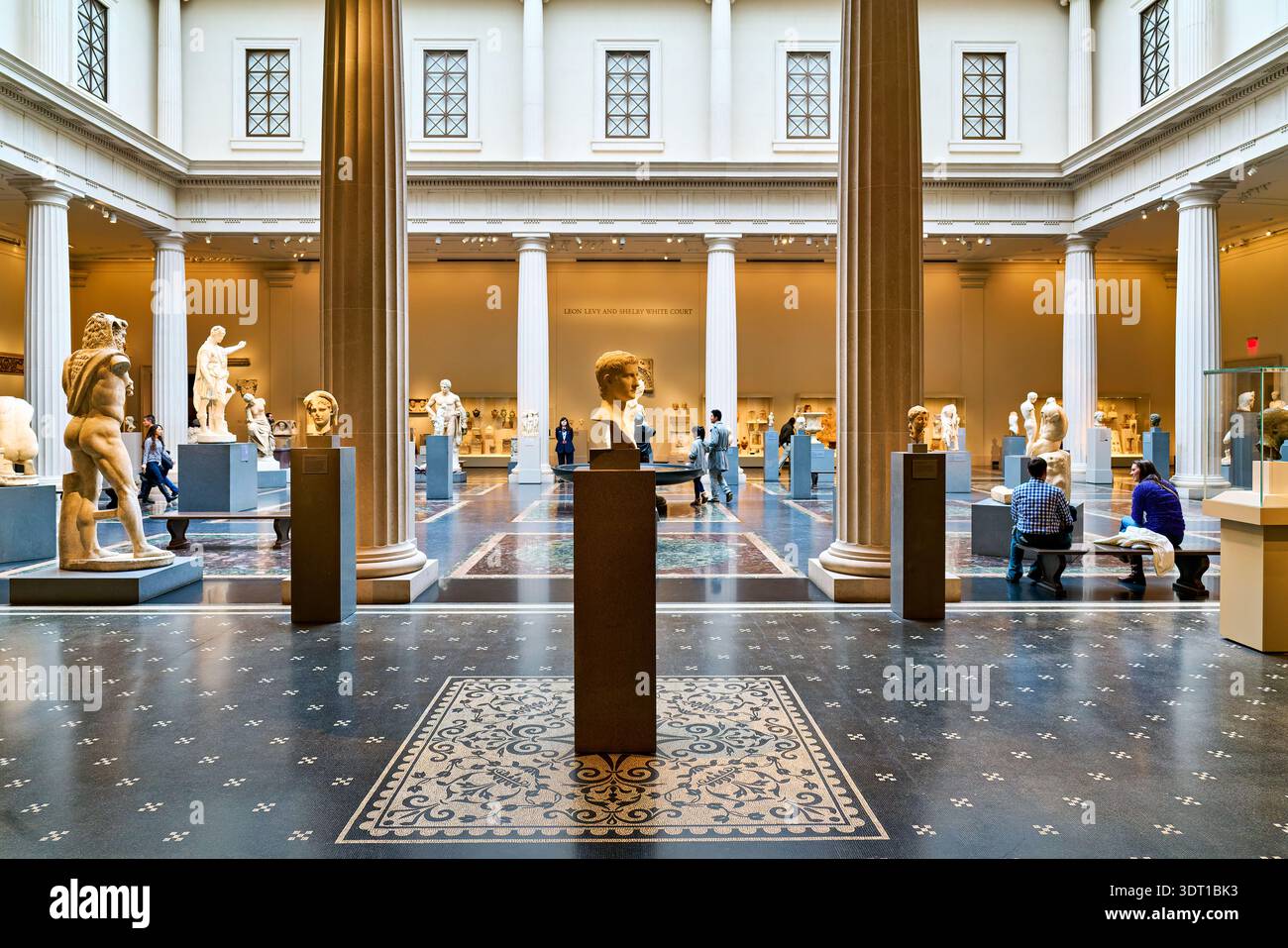 People Walk Among Ancient Sculptures In The Leon Levy And Shelby White