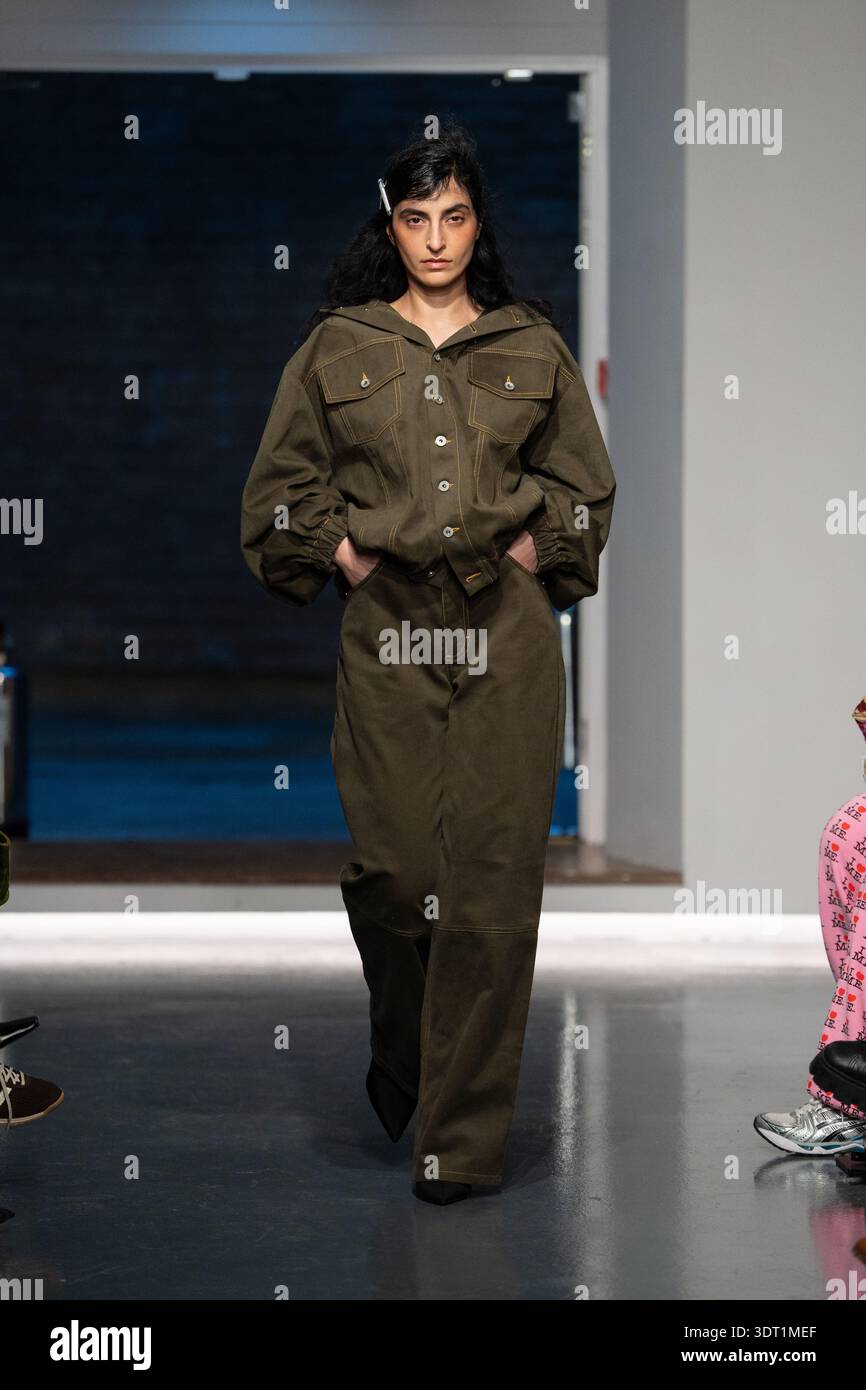 A model walks the runway at the Ksenia Schnaider Fashion show during ...