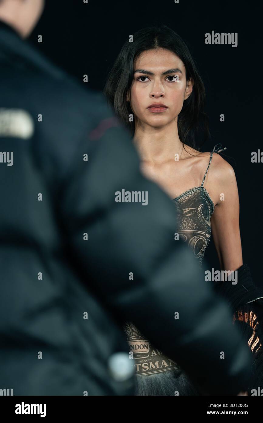 A model walks the runway at the Agro Fashion show during the London ...