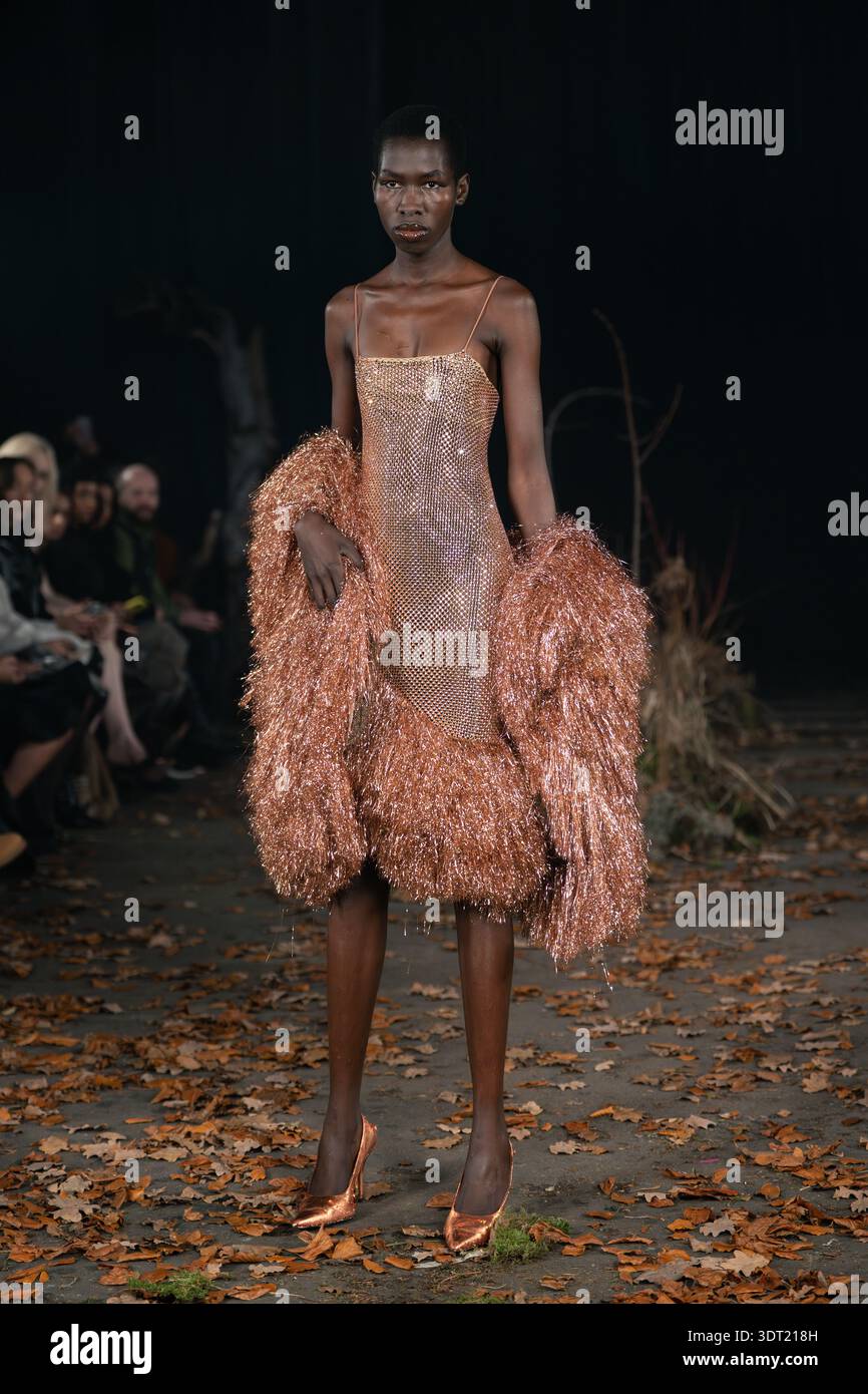 A model walks the runway at the Agro Fashion show during the London ...