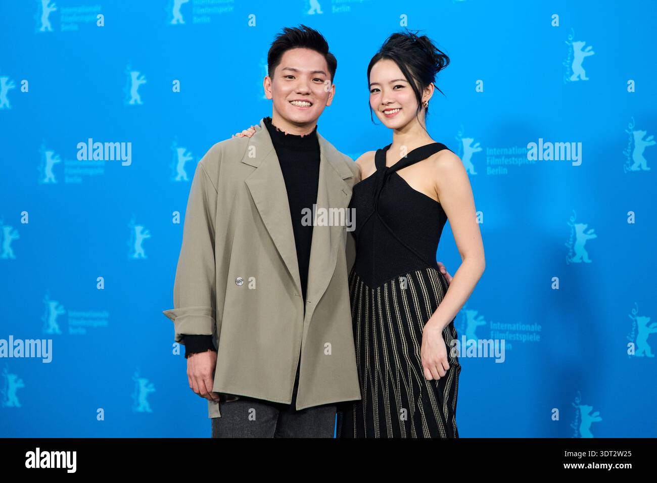 Koh Jia Ler, left, and Regene Lim pose for photographers at the photo ...