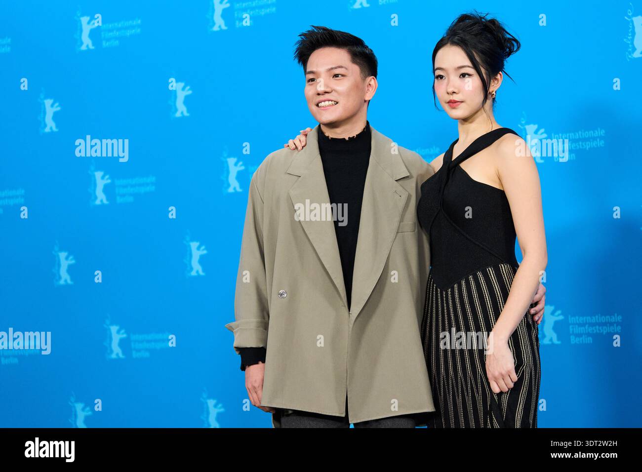 Koh Jia Ler, left, and Regene Lim pose for photographers at the photo ...