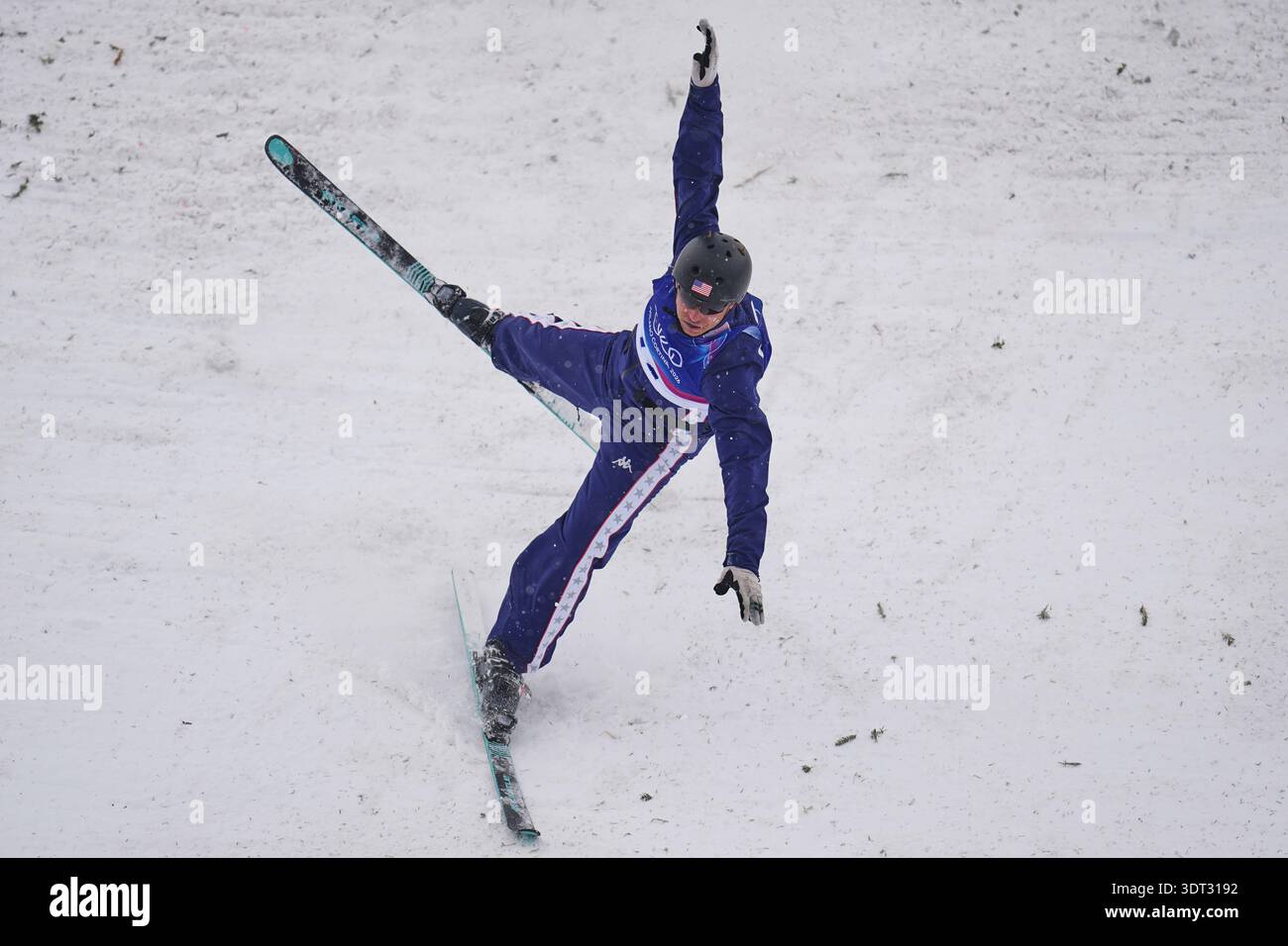 United States' Derek Krueger lands during the men's freestyle skiing aerials finals at the 2026 ...