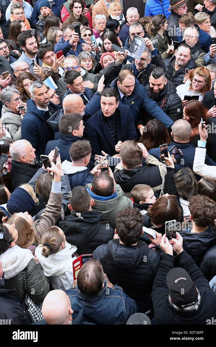 Rassemblement National President Jordan Bardella is surrounded by ...
