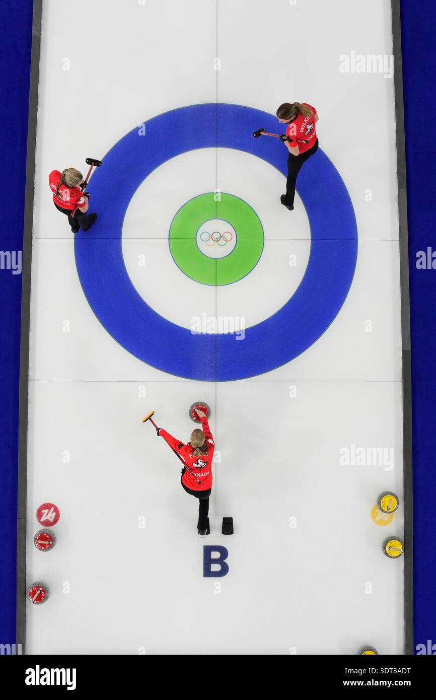 Canada's Emma Miskew, left, Sarah Wilkes, right, and Tracy Fleury ...