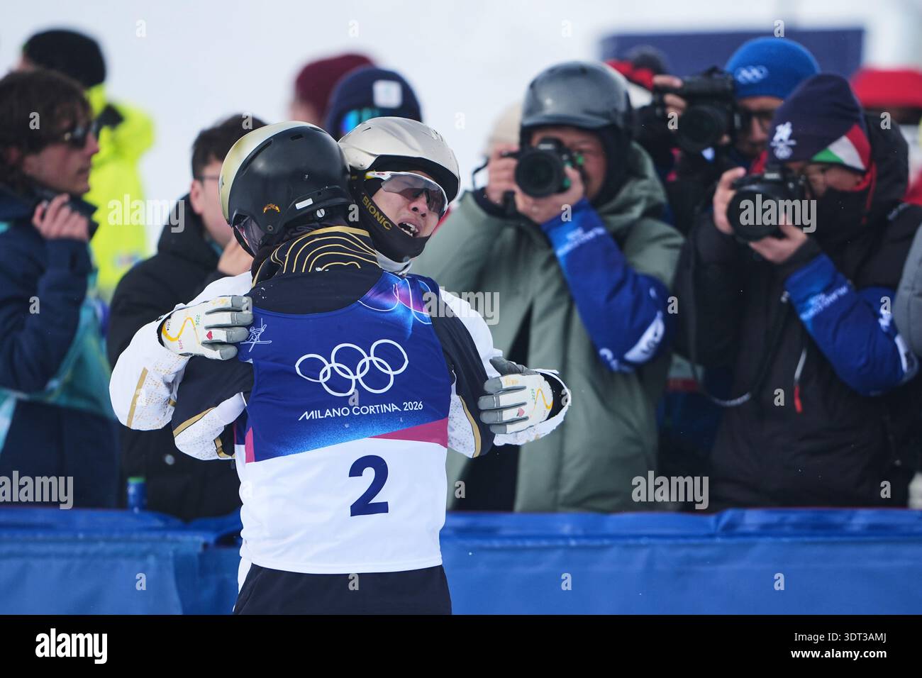 Bronze medalist China's Li Tianma (2) celebrates with gold medalist ...