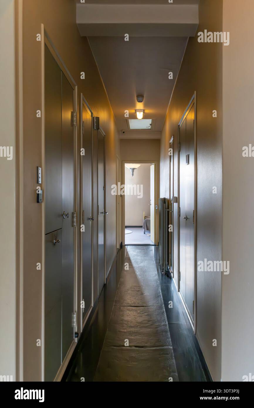 Narrow first floor corridor with the yellow bedroom at the end ...