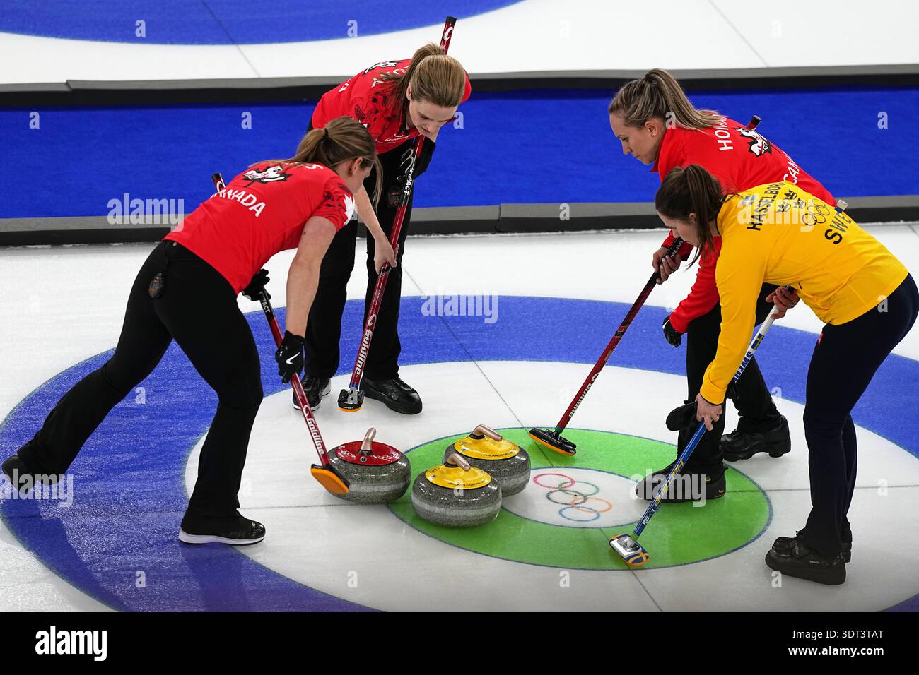 From left, Canada's Sarah Wilkes, Tracy Fleury, Rachel Homan and Sweden ...
