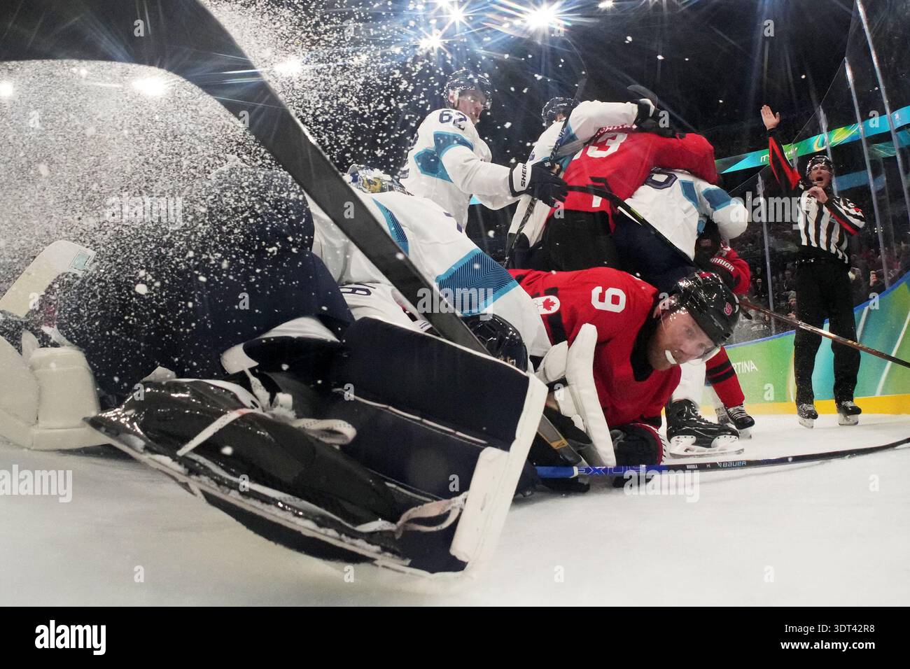 Canada's Sam Bennett (9) challenges with Finland's Niko Mikkola (77 ...