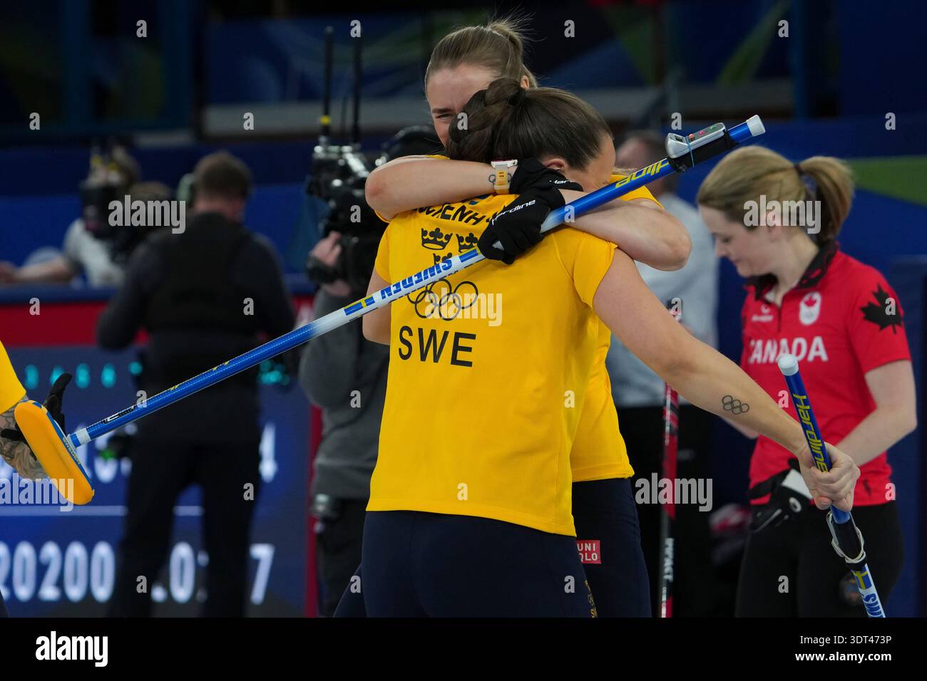 Sweden's Sara McManus and teammate Agnes Knochenhauer, left, celebrate ...