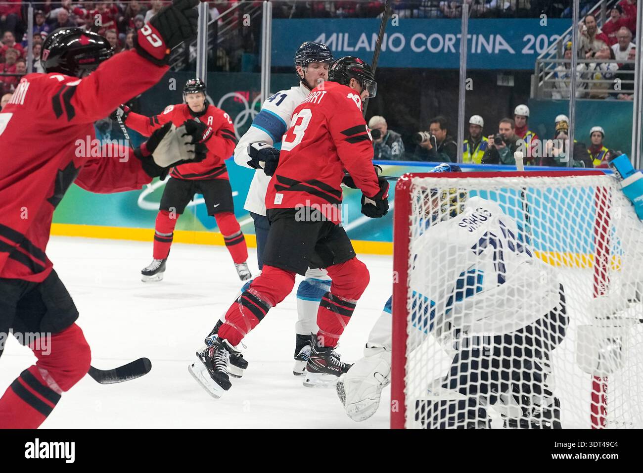 Canada's Sam Reinhart (13) celebrates after scoring his side's opening ...