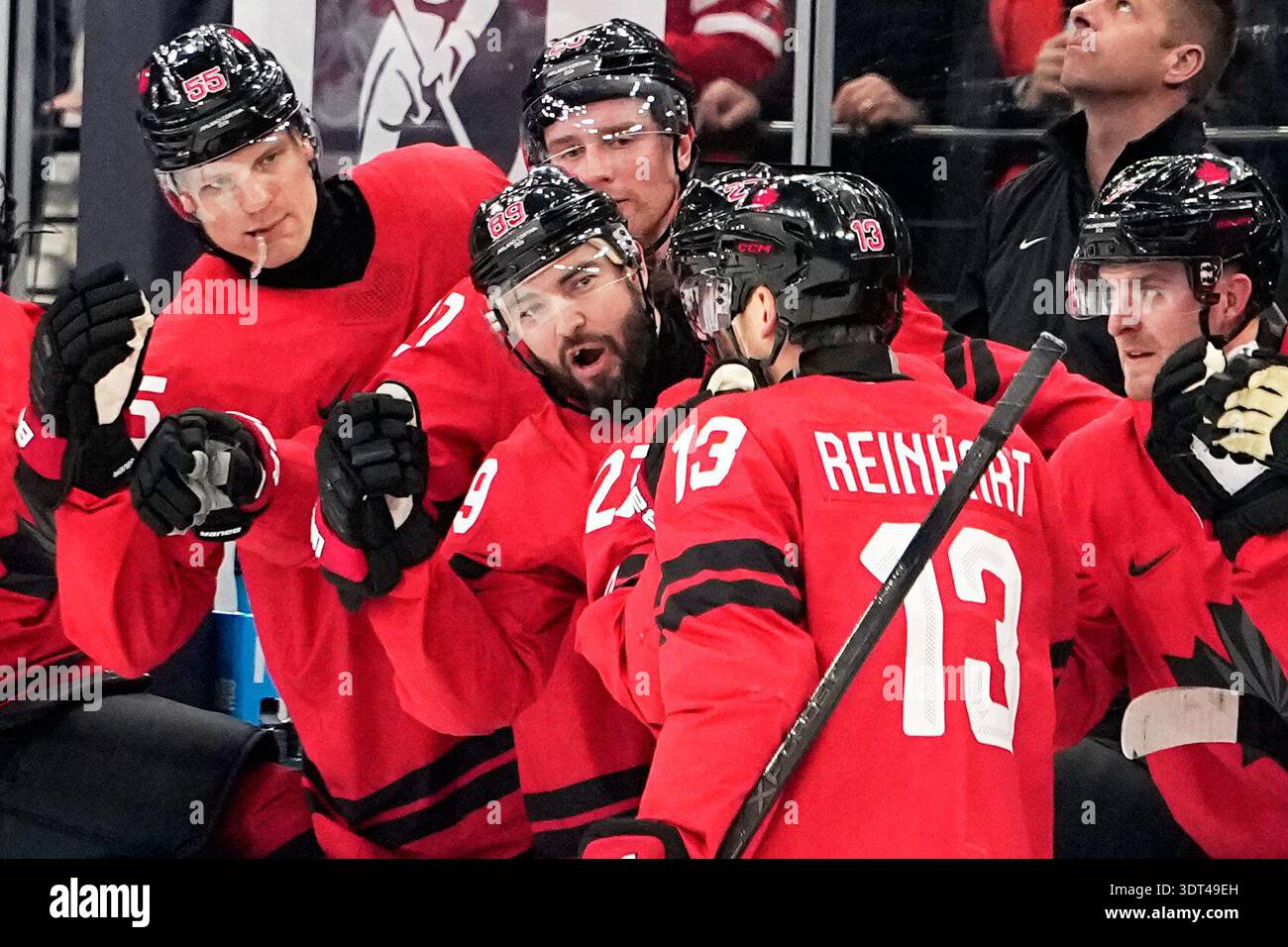 Canada's Sam Reinhart (13) celebrates after scoring his side's opening ...
