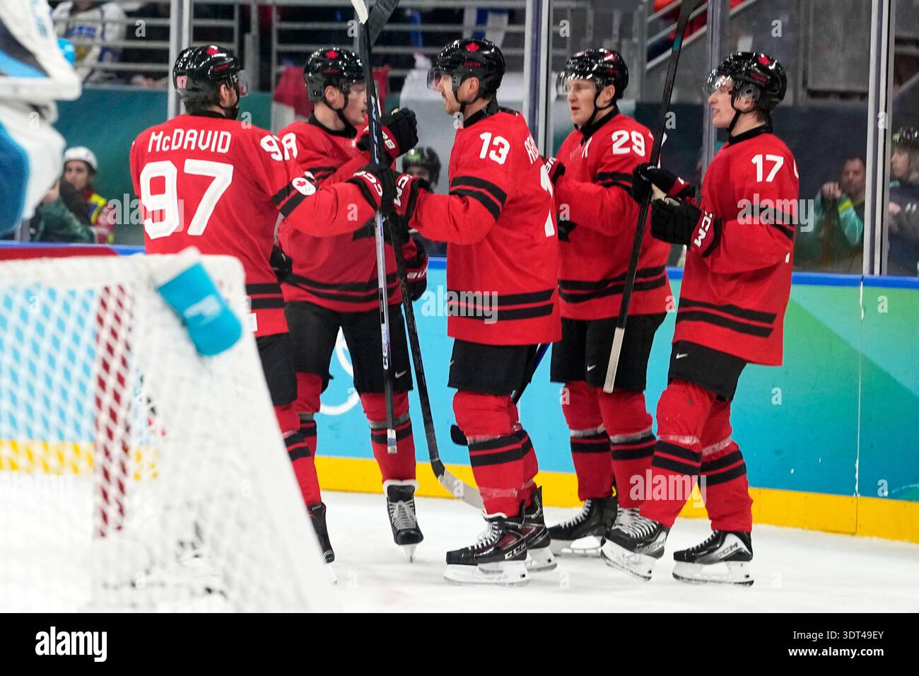 Canada's Sam Reinhart (13) celebrates after scoring his side's opening ...