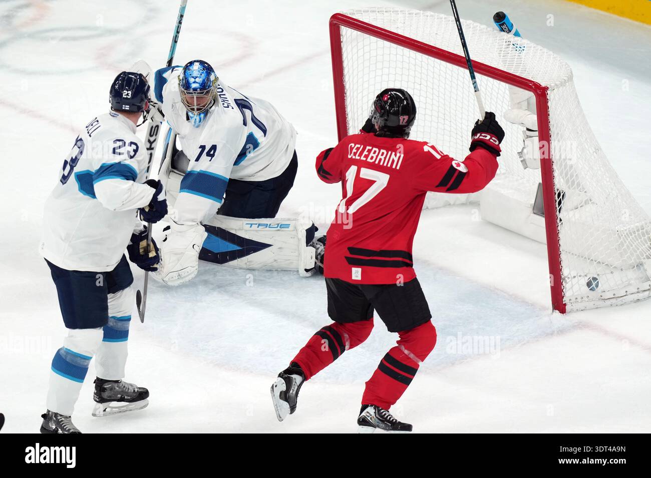 Canada's Macklin Celebrini (17) celebrates after teammate Sam Reinhart ...