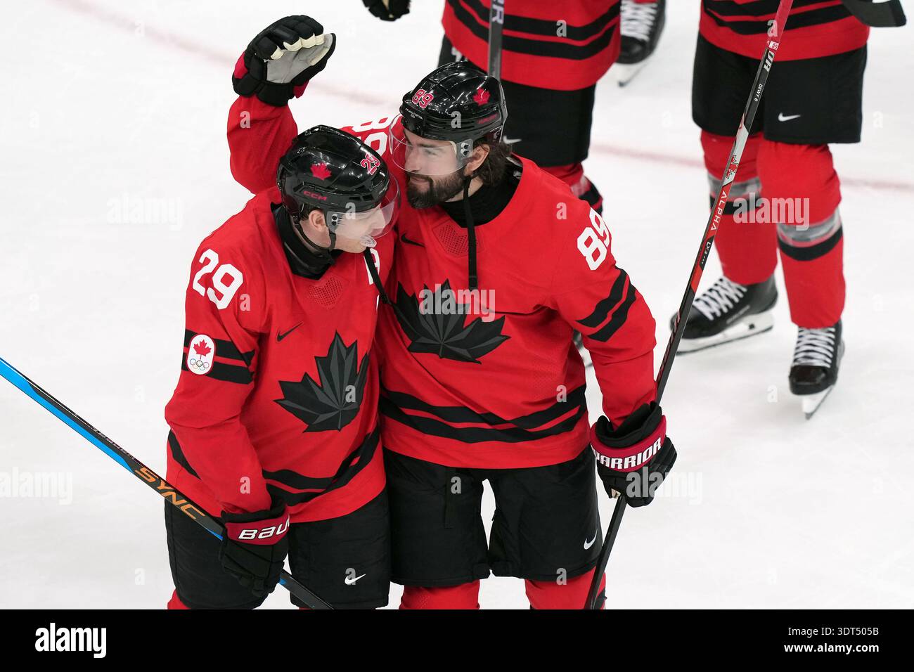 Canada's Nathan MacKinnon (29) and Drew Doughty (89) celebrate after ...