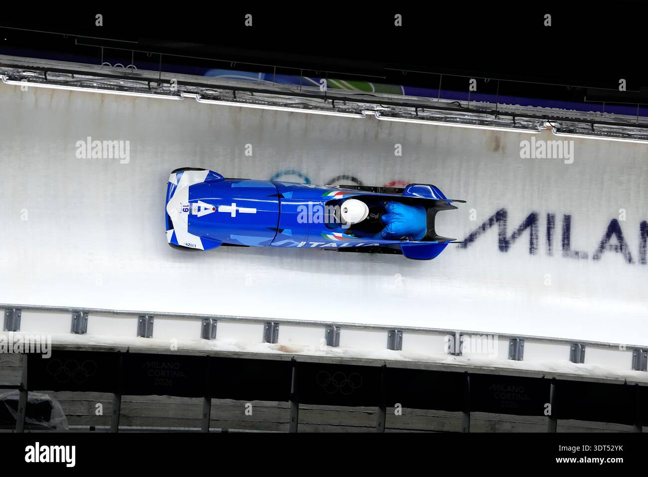 Italy's Giada Andreutti, right, and Alessia Gatti slide down the track ...
