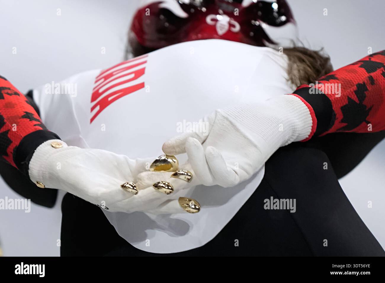 Courtney Sarault of Canada competes during a short track speed skating ...