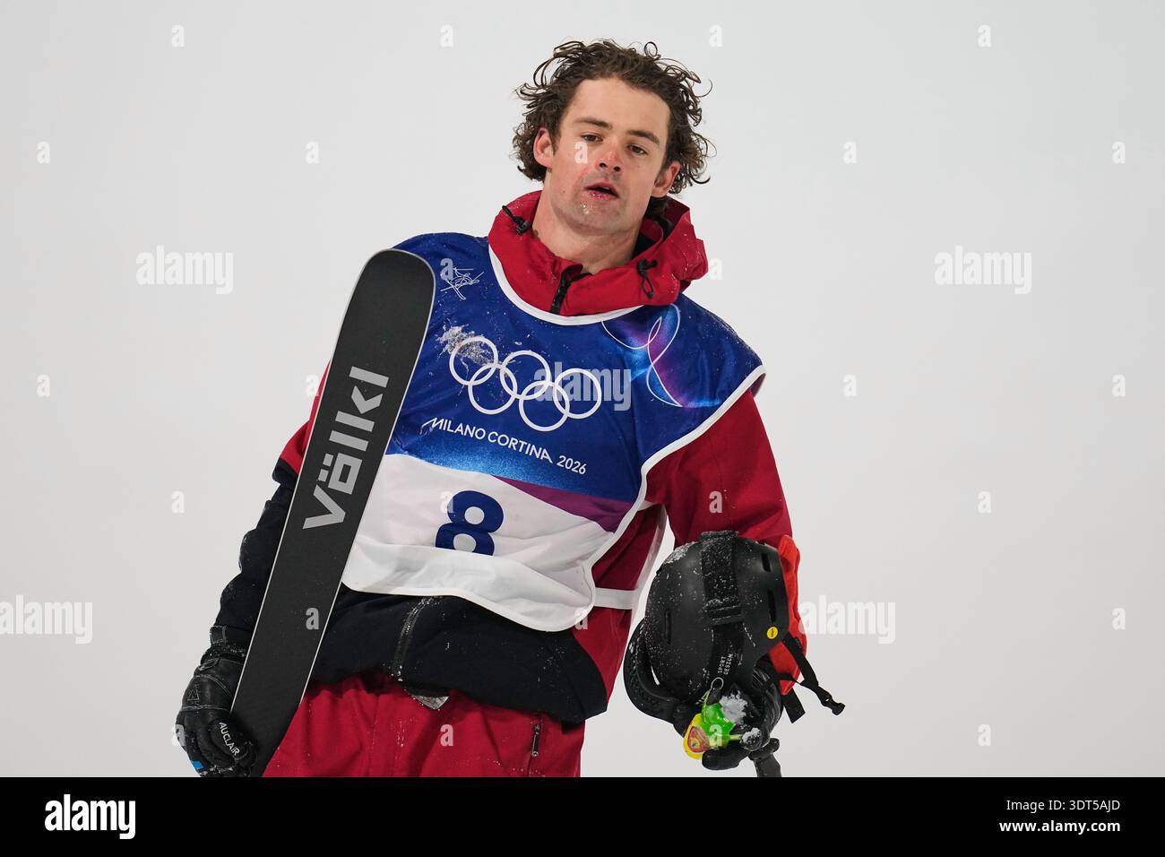 Canada's Andrew Longino reacts after crashing and breaking a binding ...
