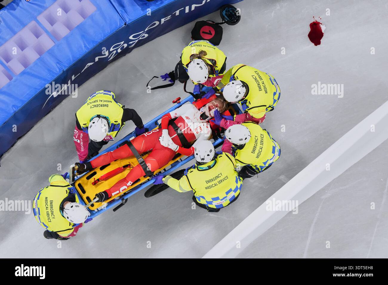 Kamila Sellier of Poland is assisted by the emergency medical service ...