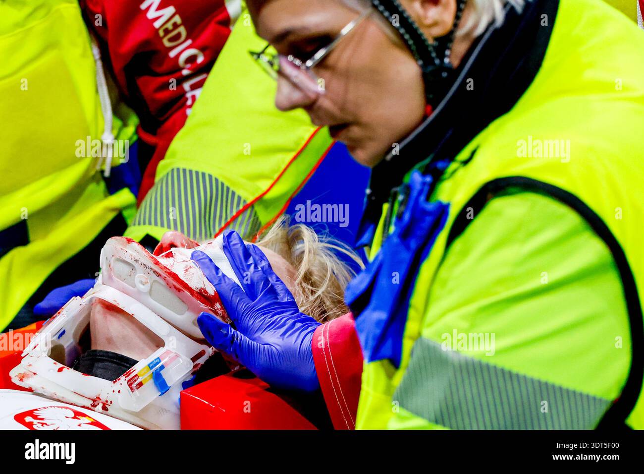 crash and injured Kamila Sellier-Stormowska of Poland receives medical ...