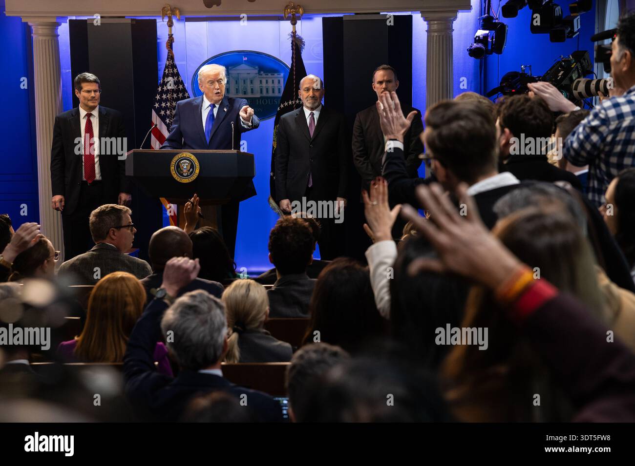 President Donald Trump calls on a reporter during a press conference at ...