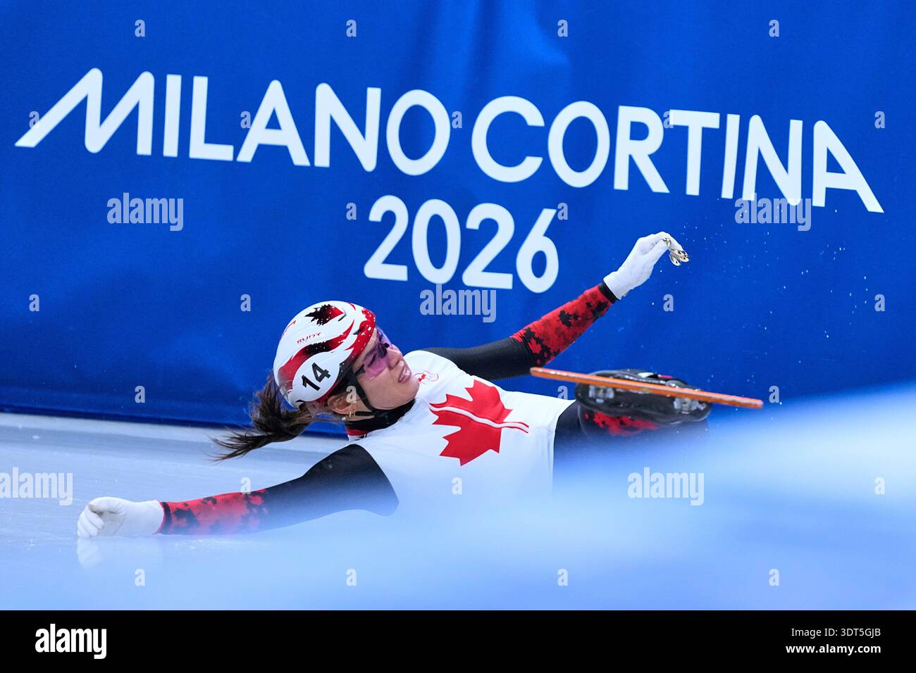 Courtney Sarault of Canada falls during a short track speed skating ...
