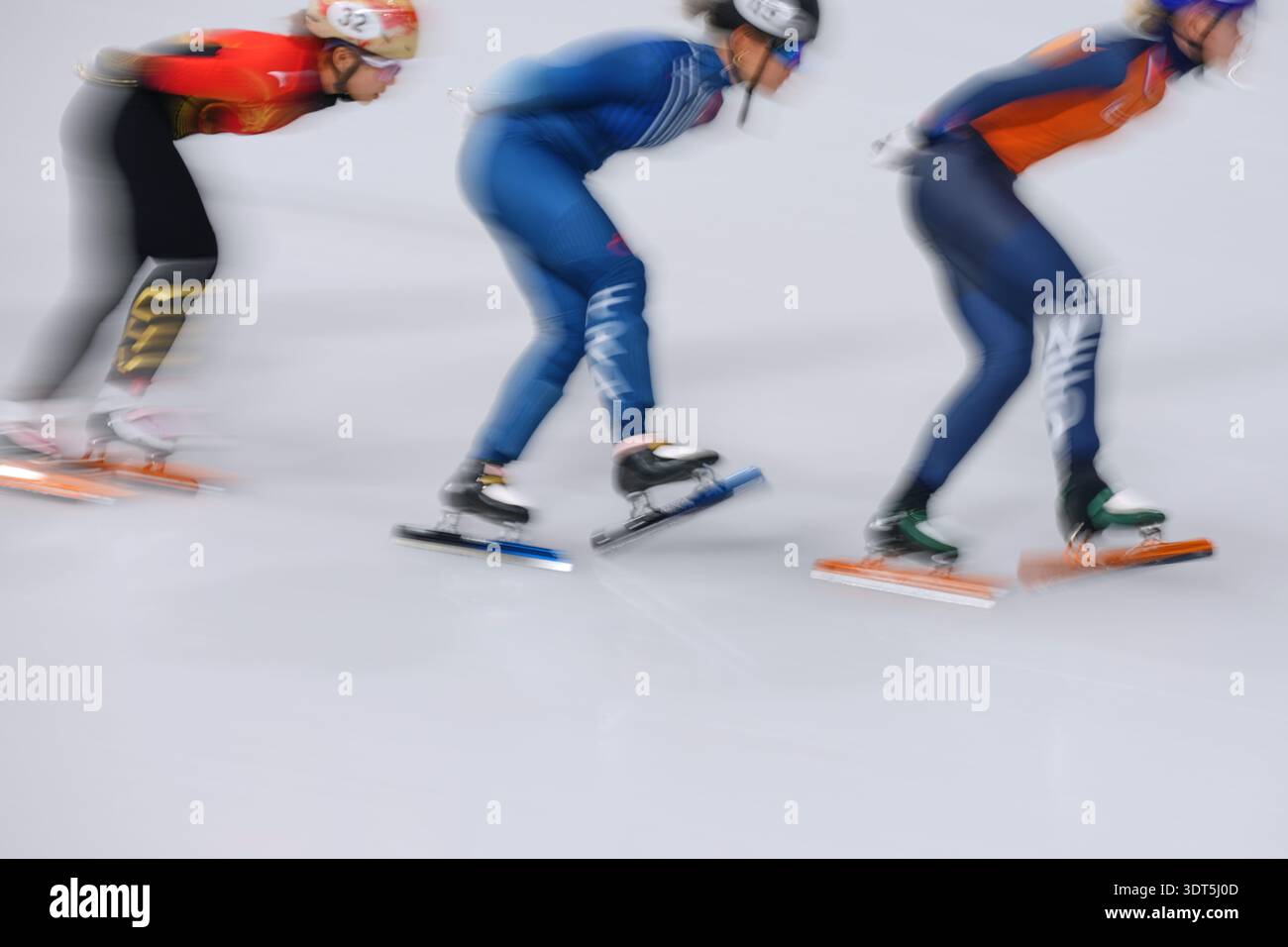 Athletes compete during a short track speed skating women's 1500 meters ...