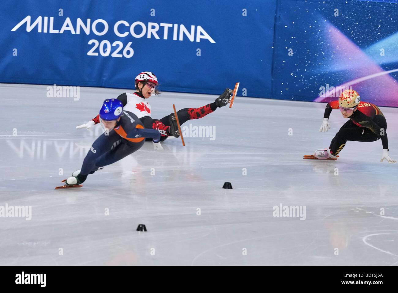 Courtney Sarault of Canada falls during a short track speed skating ...